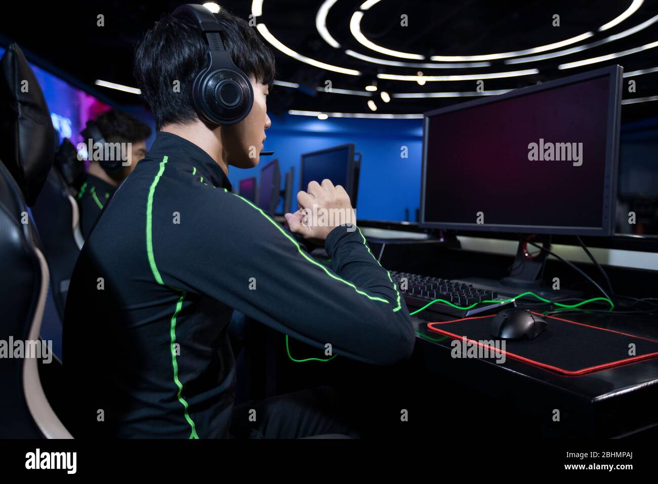 Young Chinese men playing esports Stock Photo - Alamy
