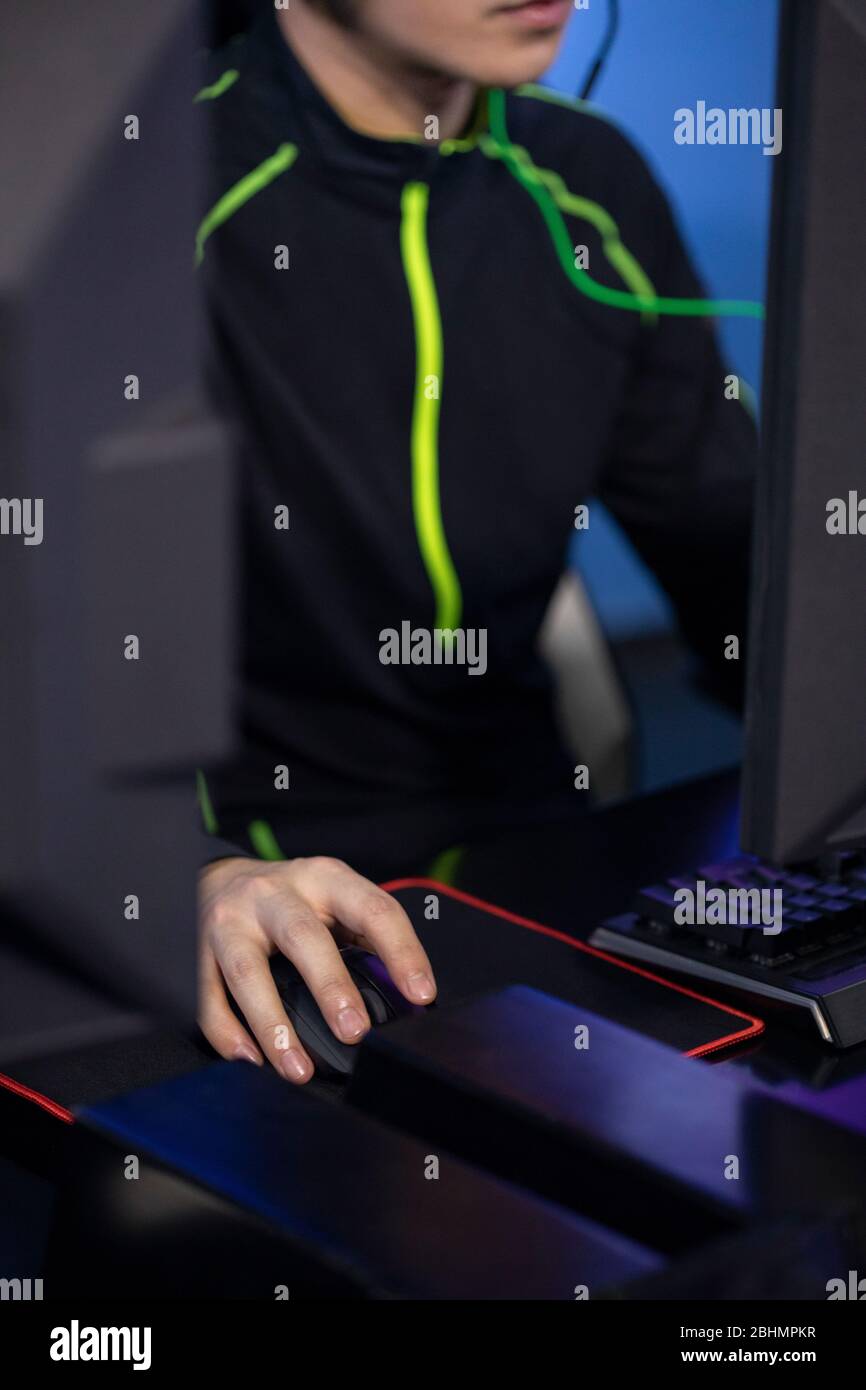 Young Chinese man playing esports Stock Photo - Alamy