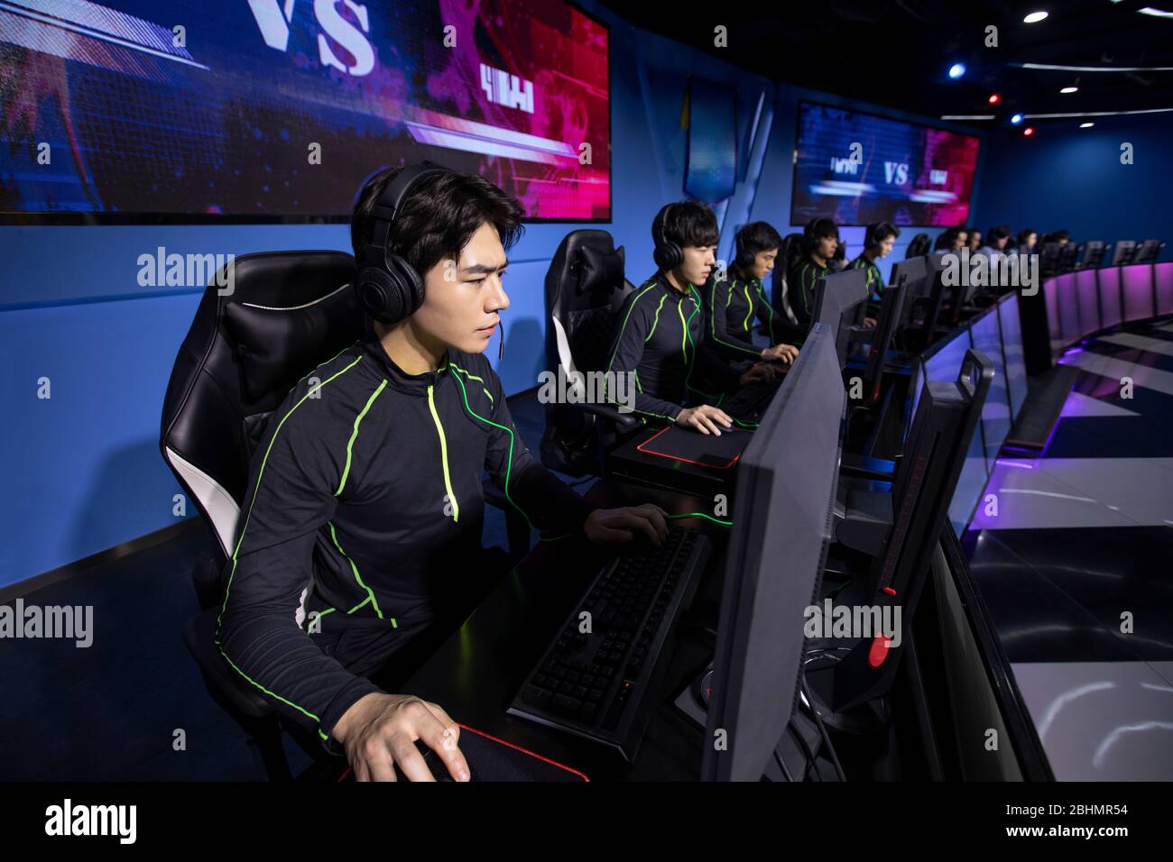 Young Chinese men playing esports Stock Photo - Alamy