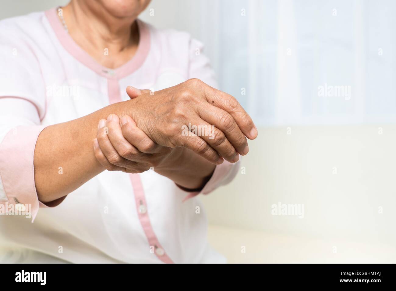 wrist hand pain of old woman, healthcare problem of senior concept ...