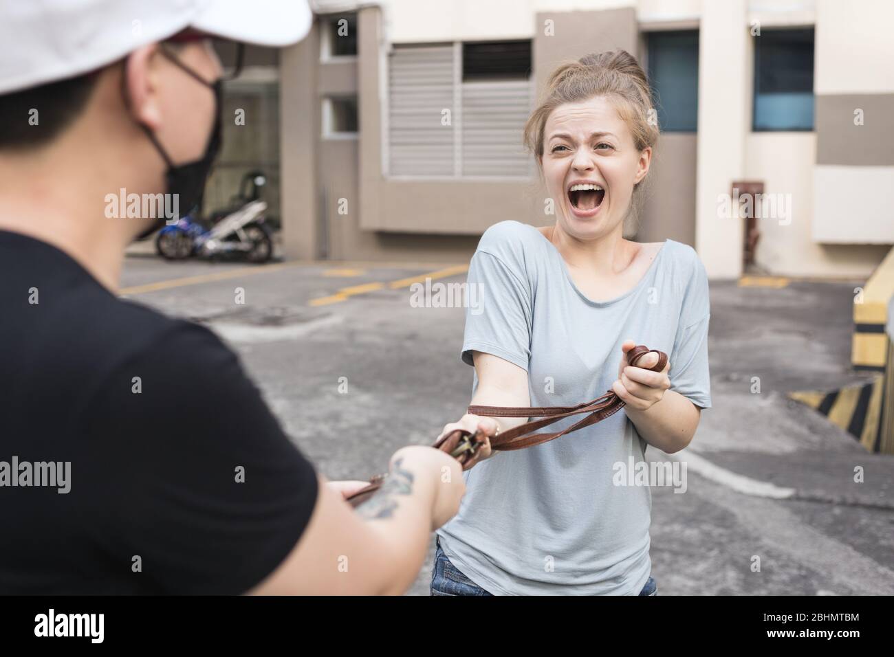 Female robbery hi-res stock photography and images - Alamy