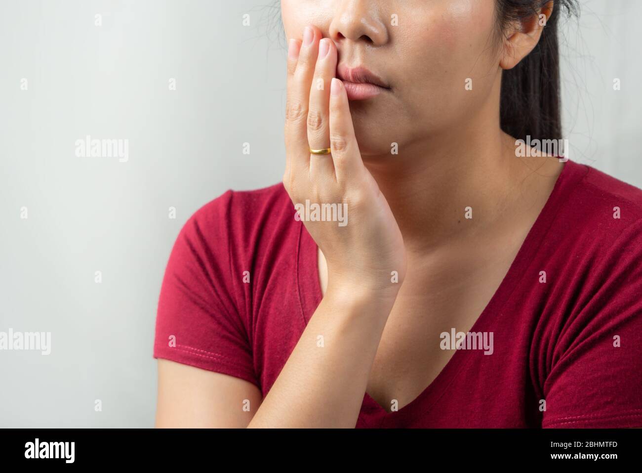 Beautiful woman with suffering from toothache, tooth decay or ...