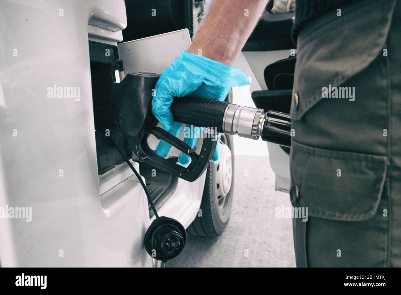 Pumping gas coronavirus hi-res stock photography and images - Alamy