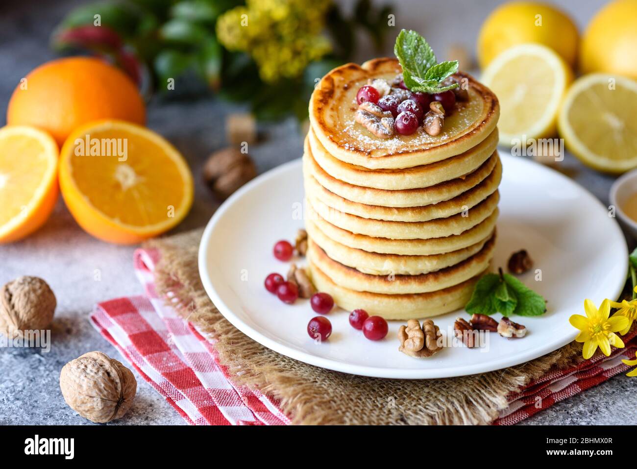 Delicious fresh beautiful pancakes with citrus honey and jam. Delicious ...