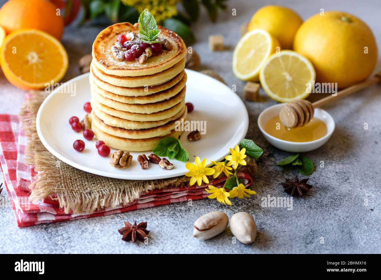 Delicious fresh beautiful pancakes with citrus honey and jam. Delicious ...