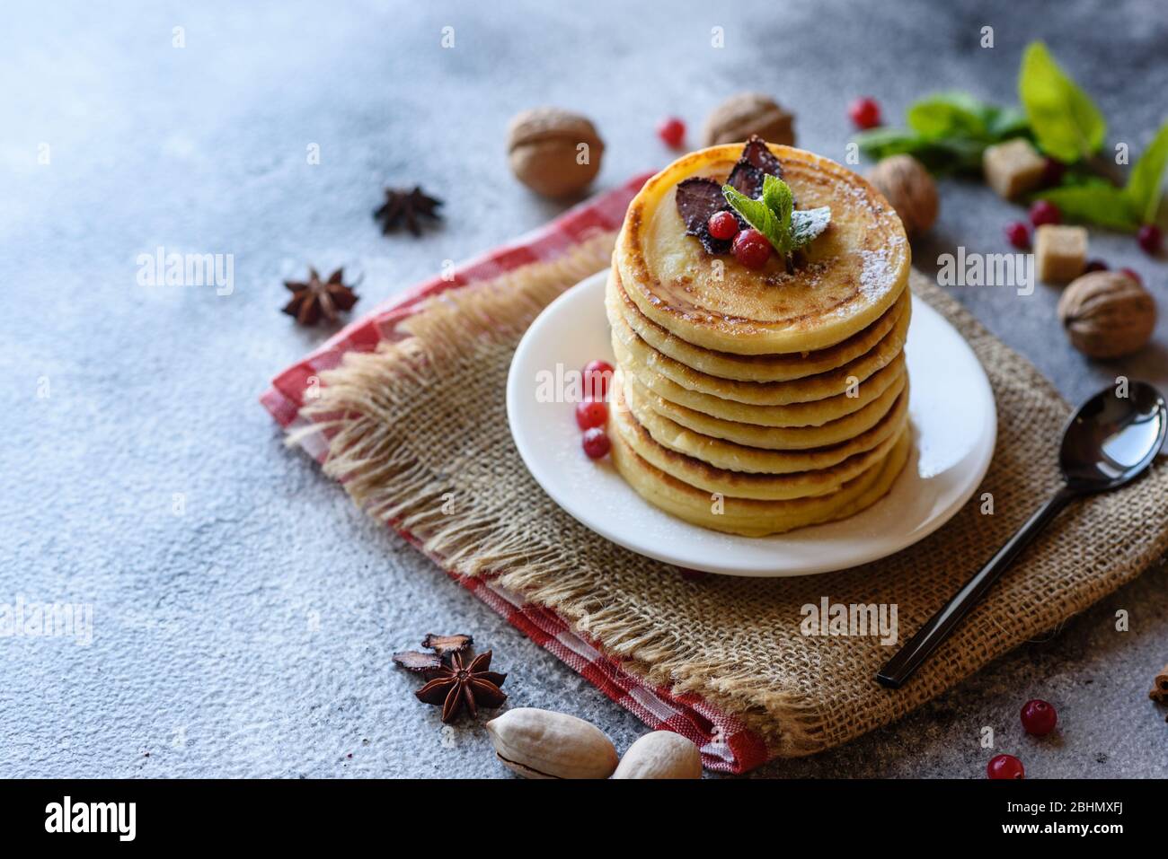 Delicious fresh beautiful pancakes with citrus honey and jam. Delicious ...