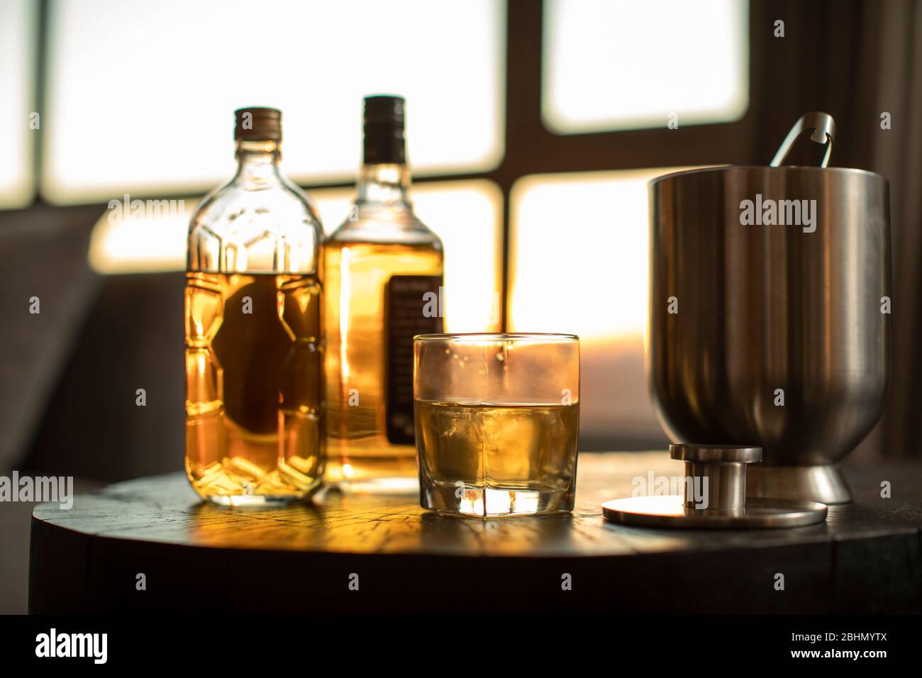 Whiskey bottle and glass Stock Photo - Alamy