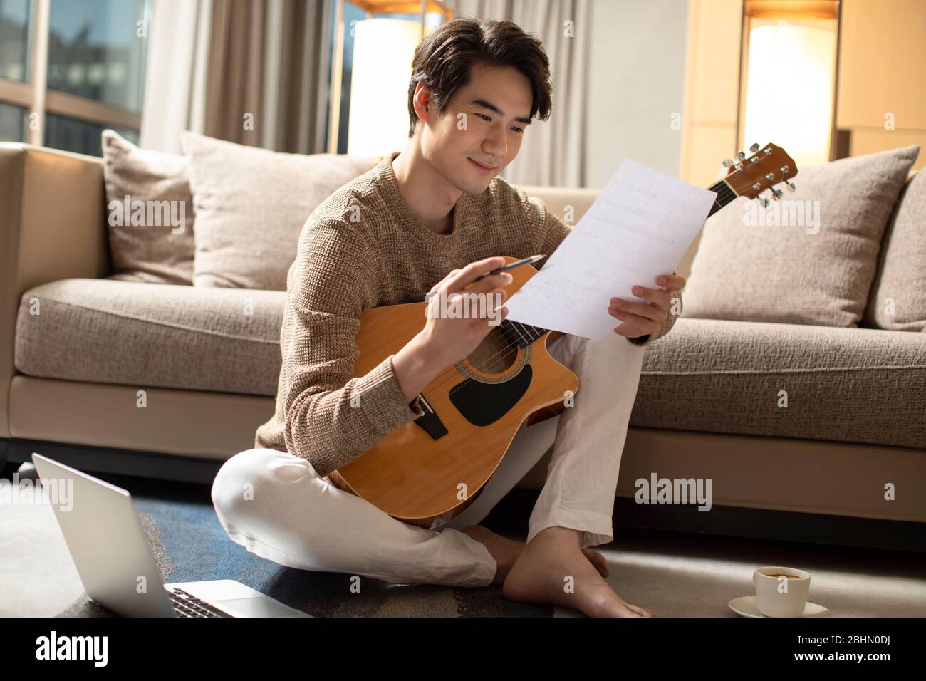 Young chinese man writing hi-res stock photography and images - Alamy