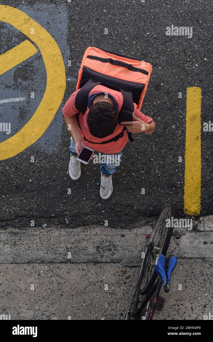 Bike driver from Rappi, a popular home delivery app in Colombia Stock ...