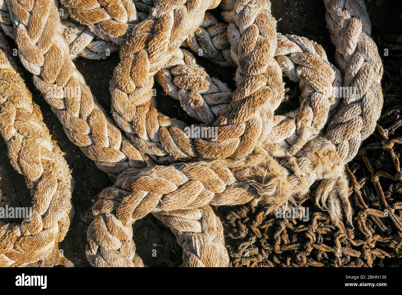 old dirty battered sea rope Stock Photo - Alamy