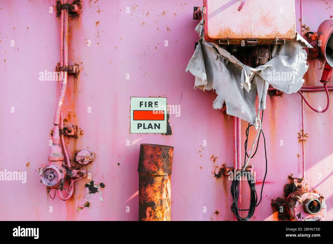 Pink Rusty Wall With Pipes Wires And Old Rags And A Fire Plan Sign Stock Photo Alamy pink-rusty-wall-with-pipes-wires-and-old-rags-and-a-fire-plan-sign-stock-photo-alamy