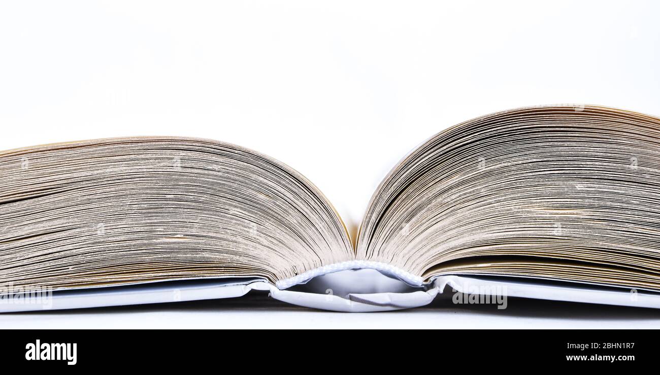 Closeup of a hardcover book open in the middle, Open book Stock Photo ...