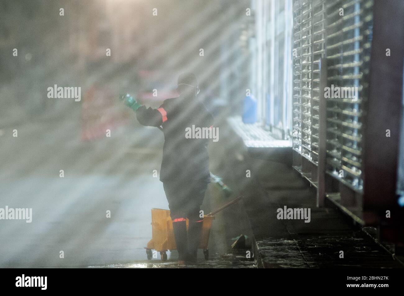 Transmilenio cleaning staff desinfects and cleans bus stops during the ...