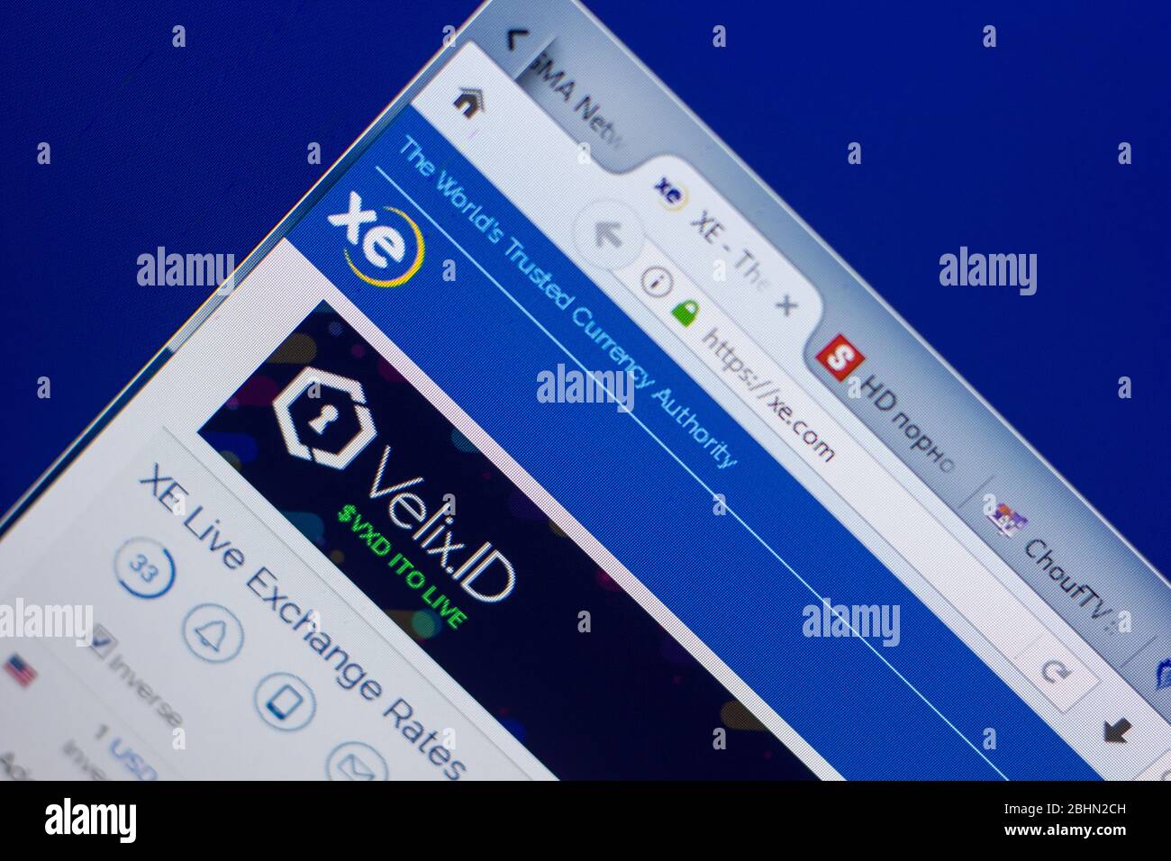 Ryazan, Russia - May 13, 2018: Xe website on the display of PC, url ...