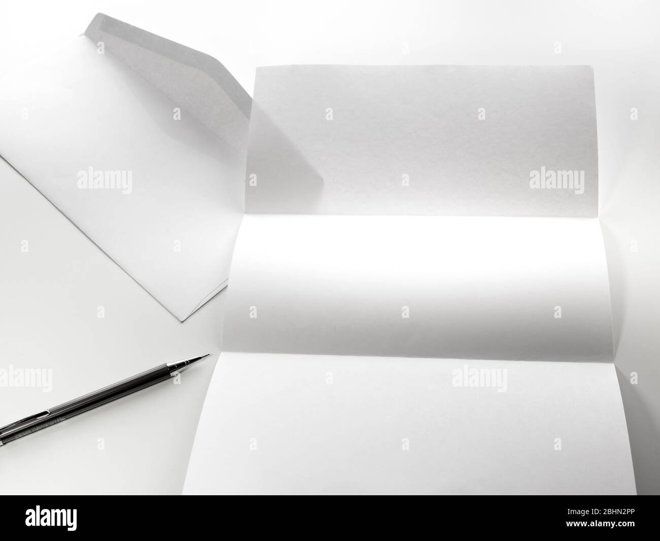 blank of letter paper and white envelope with pen Isolated on white ...