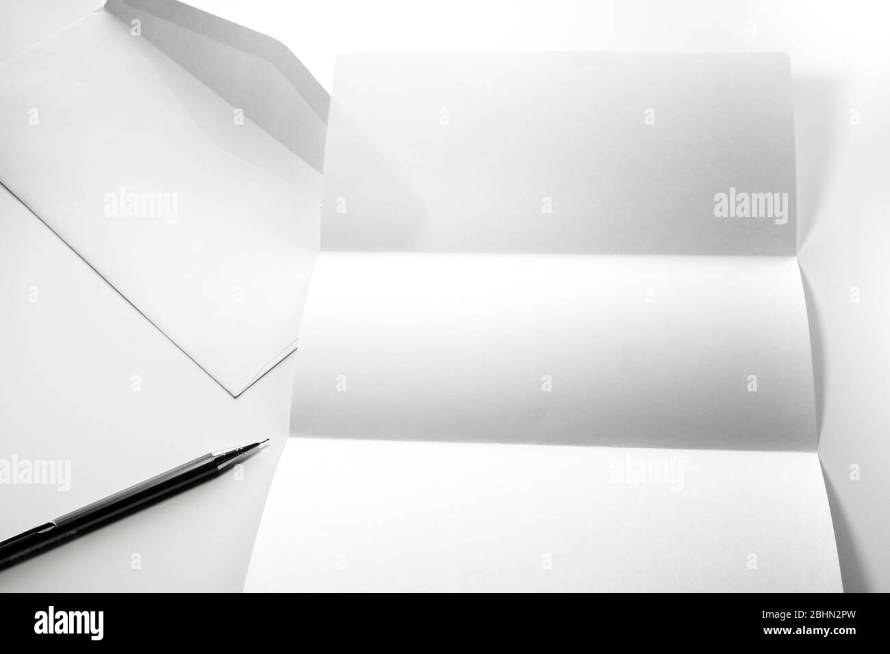 blank of letter paper and white envelope with pen Isolated on white ...