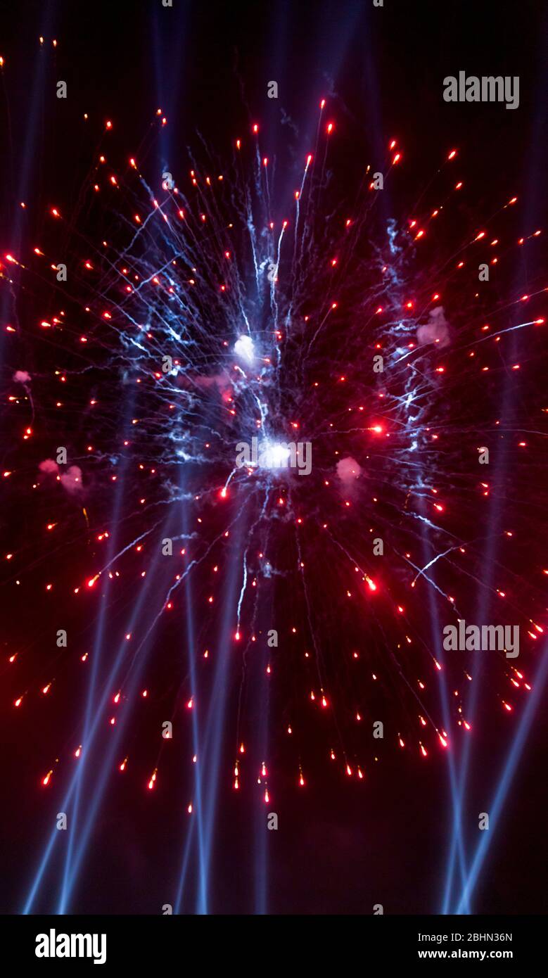 red fireworks on the black sky background. Celebration Stock Photo - Alamy
