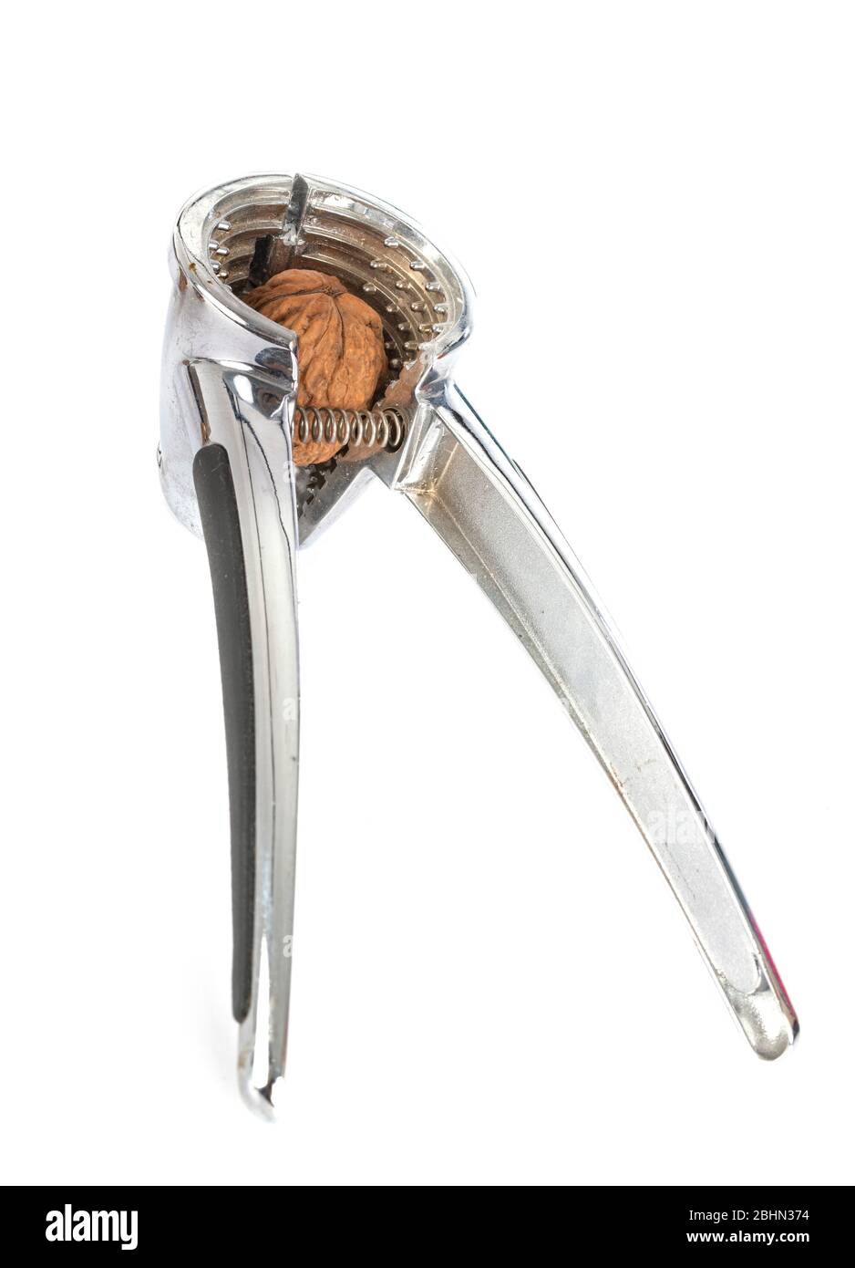 metallic nutcracker in front of white background Stock Photo - Alamy