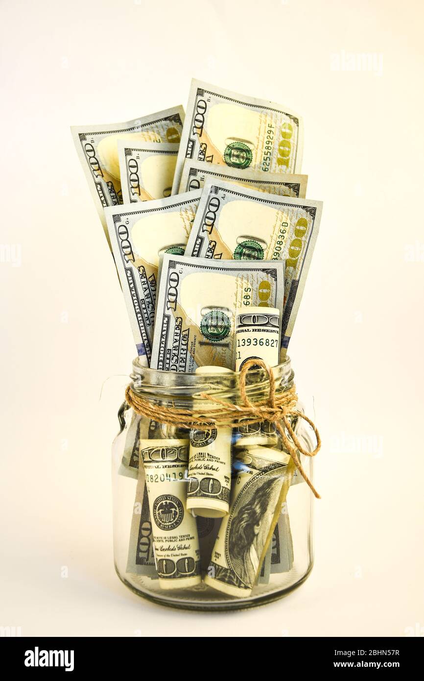 100 dollar bills jar High Resolution Stock Photography and Images - Alamy