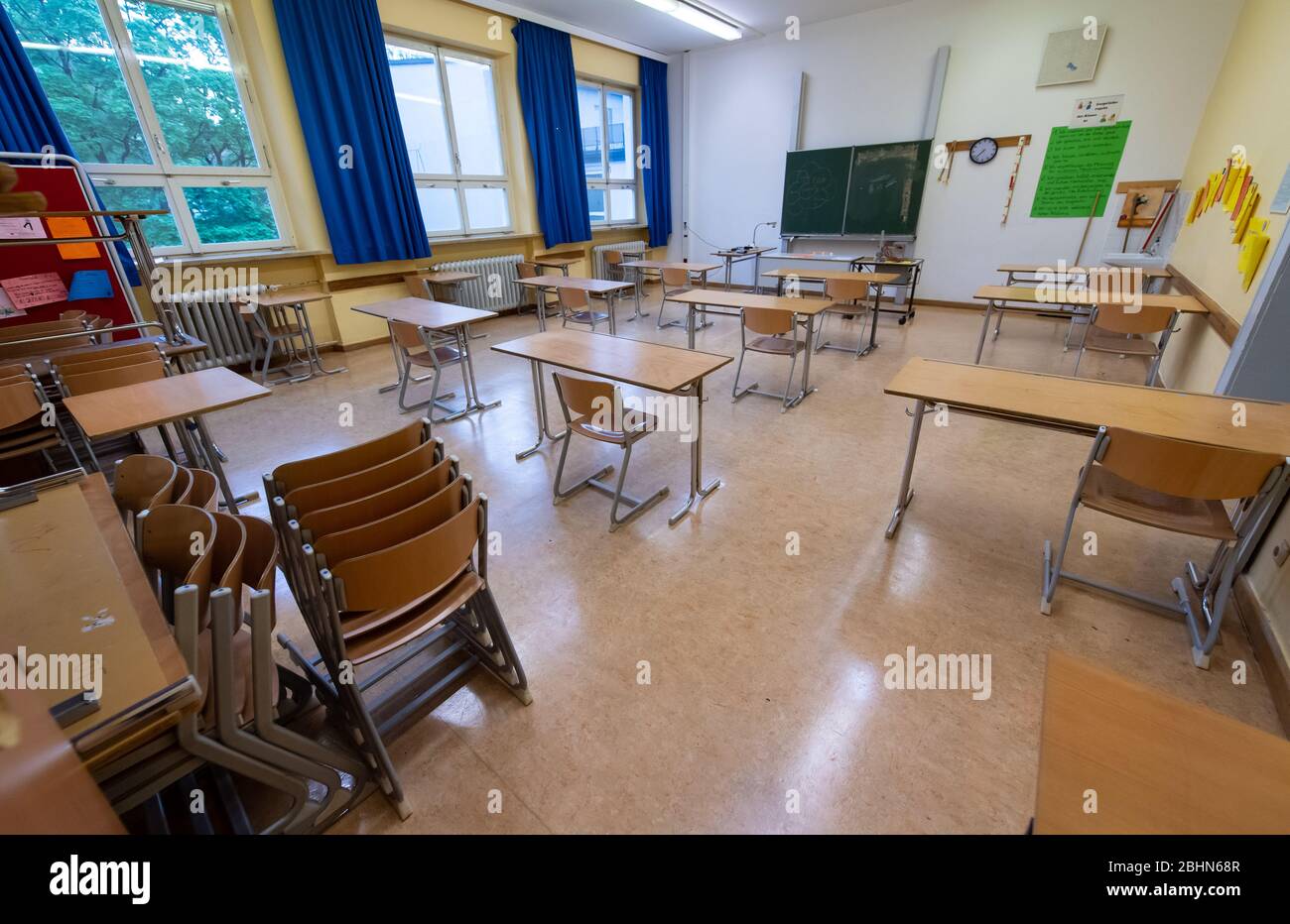 Munich, Germany. 27th Apr, 2020. The desks are placed in a classroom in ...