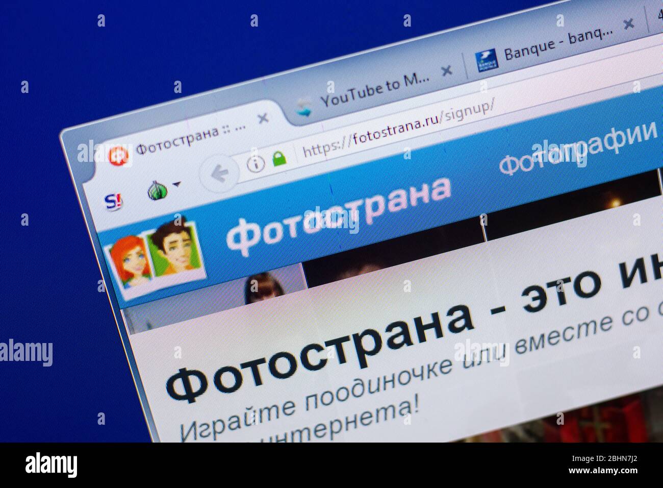 Ryazan, Russia - May 13, 2018: FotoStrana website on the display of PC ...