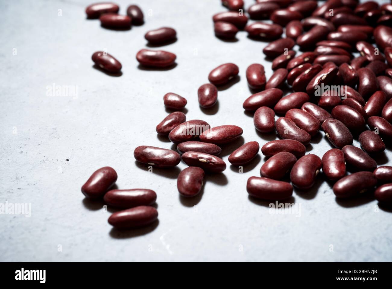 Red haricot beans on a stone table Stock Photo - Alamy