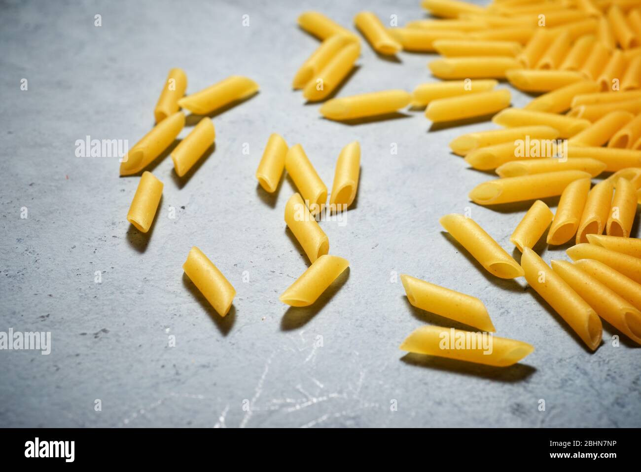 Macaroni on a stone table Stock Photo - Alamy