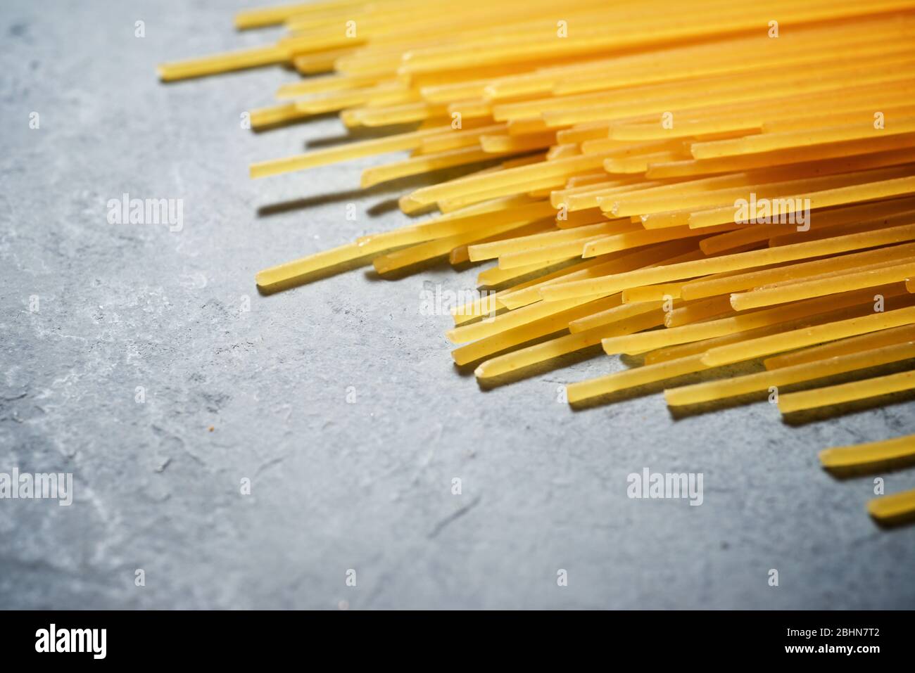 Spaghetti on a stone table Stock Photo - Alamy