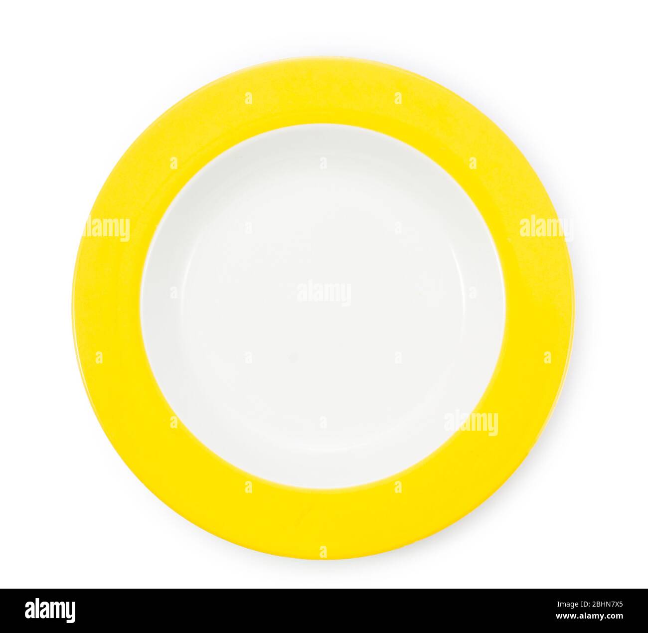 Yellow plate isolated on white background Stock Photo - Alamy