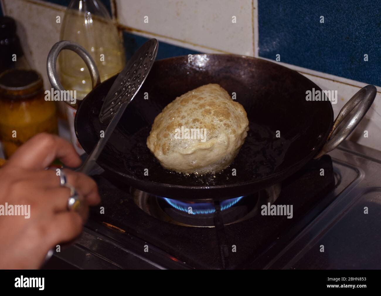 Deep Frying Hot Bengali Luchi. It is traditional bengali dish, food or ...