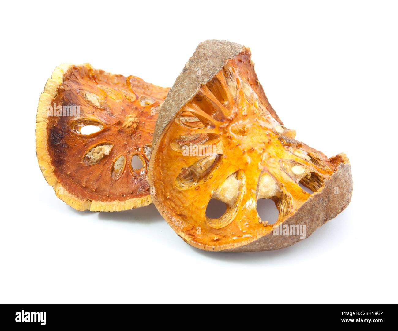 dried quince slices on a white background Stock Photo - Alamy