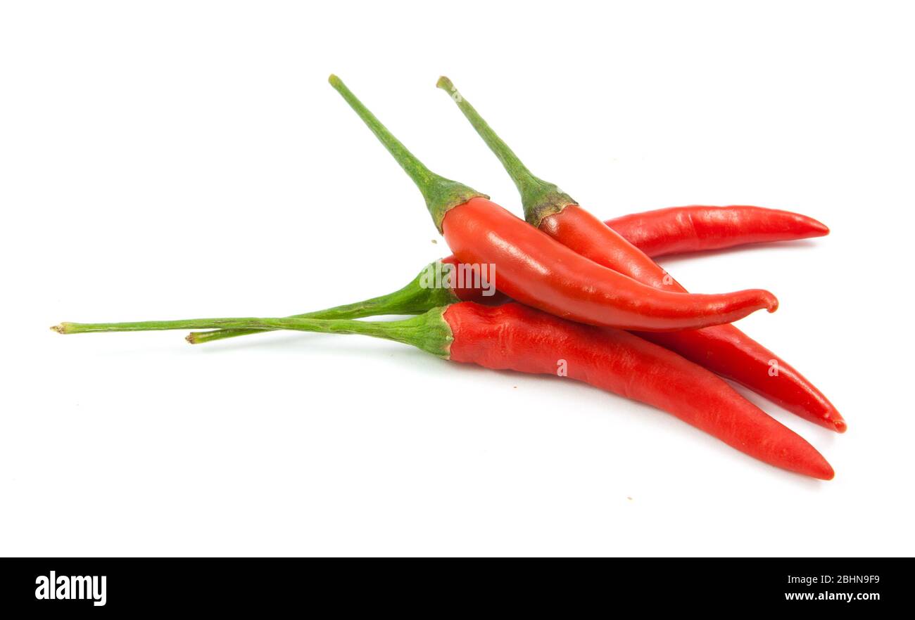 red chili peppers closeup view isolated white background Stock Photo ...