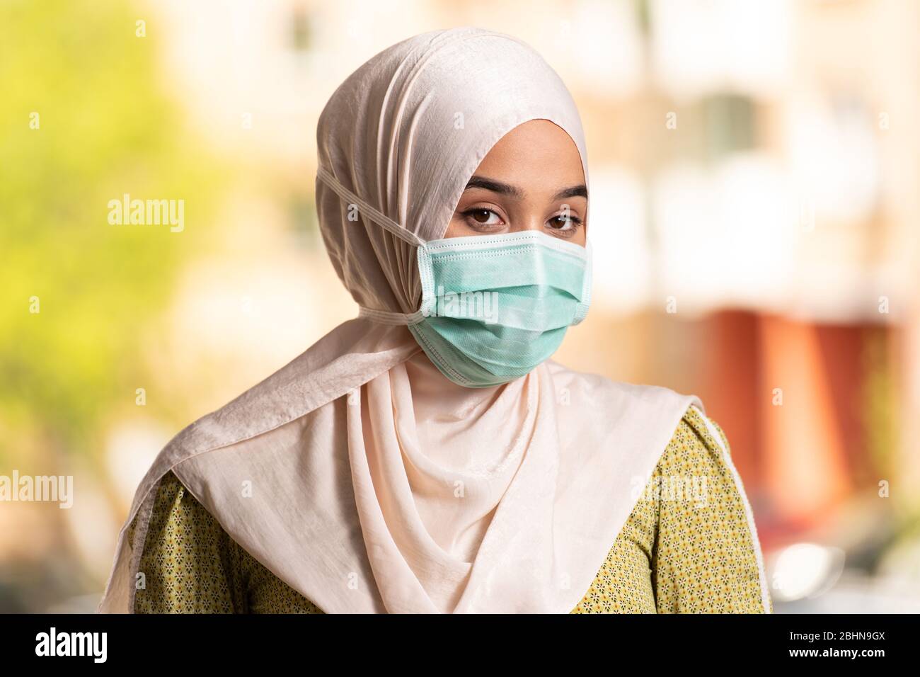 Young Muslim Woman Praying in Mosque With Surgical Mask and Gloves ...