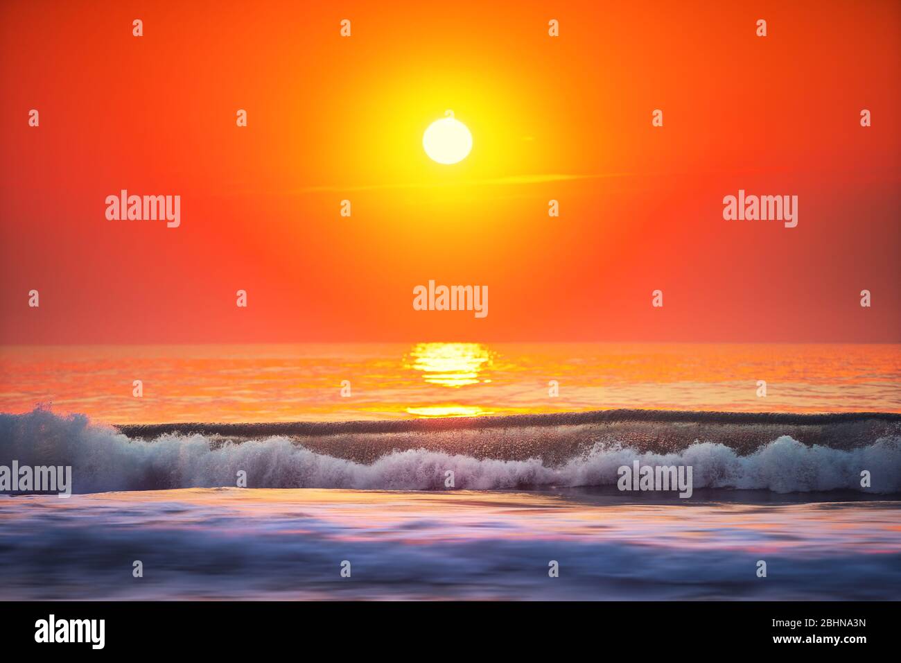 Sunrise clouds sky weather sun waves water surf hi-res stock ...