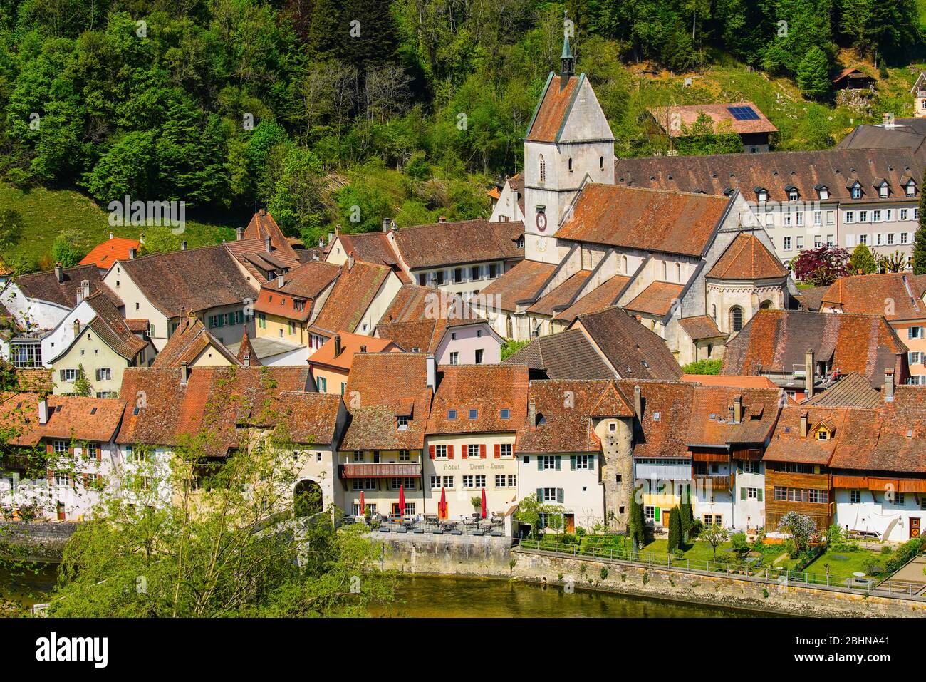 Elevated view of charming small town Saint Ursanne with medieval ...