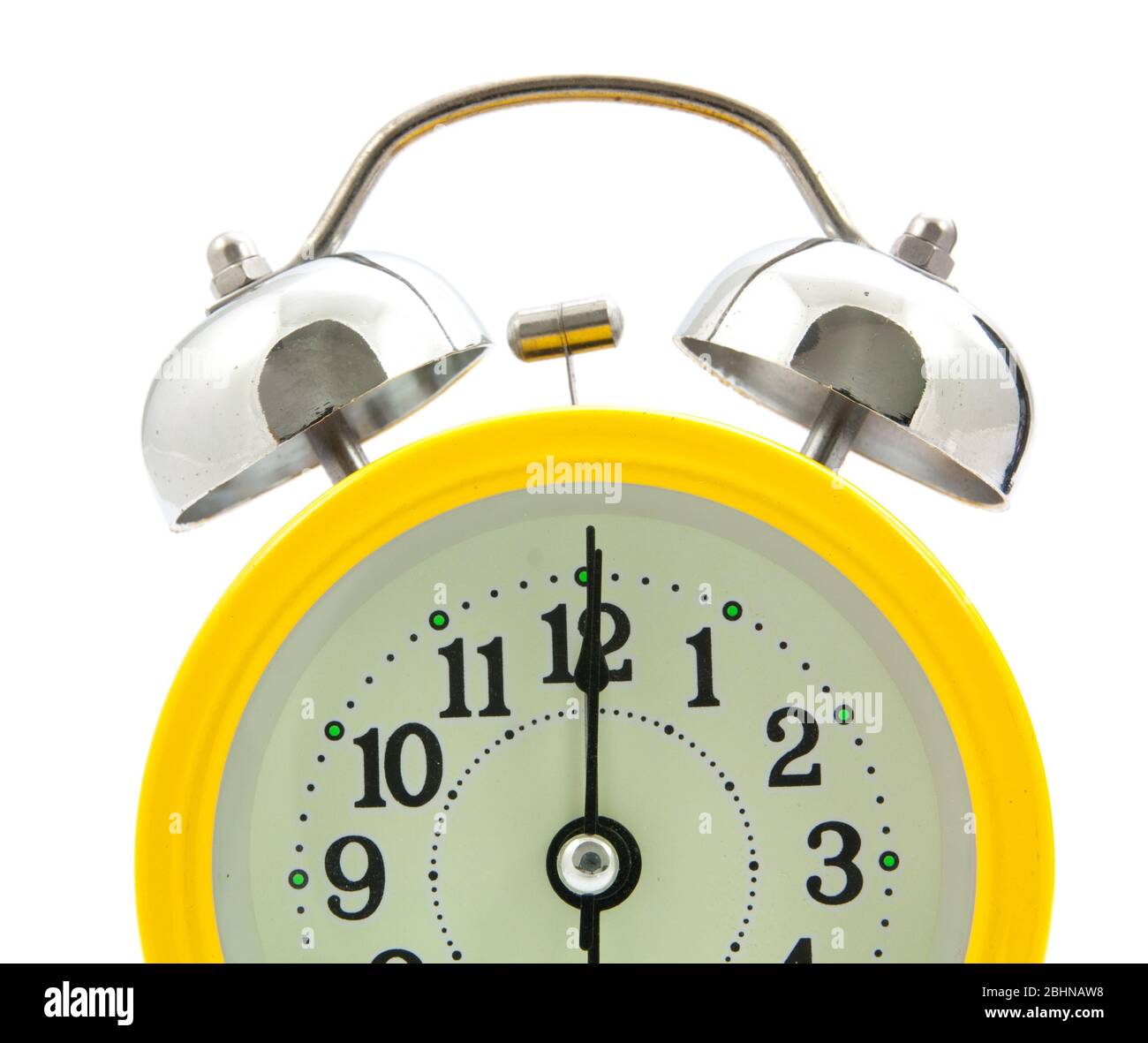 yellow alarm clock isolated on white Stock Photo - Alamy