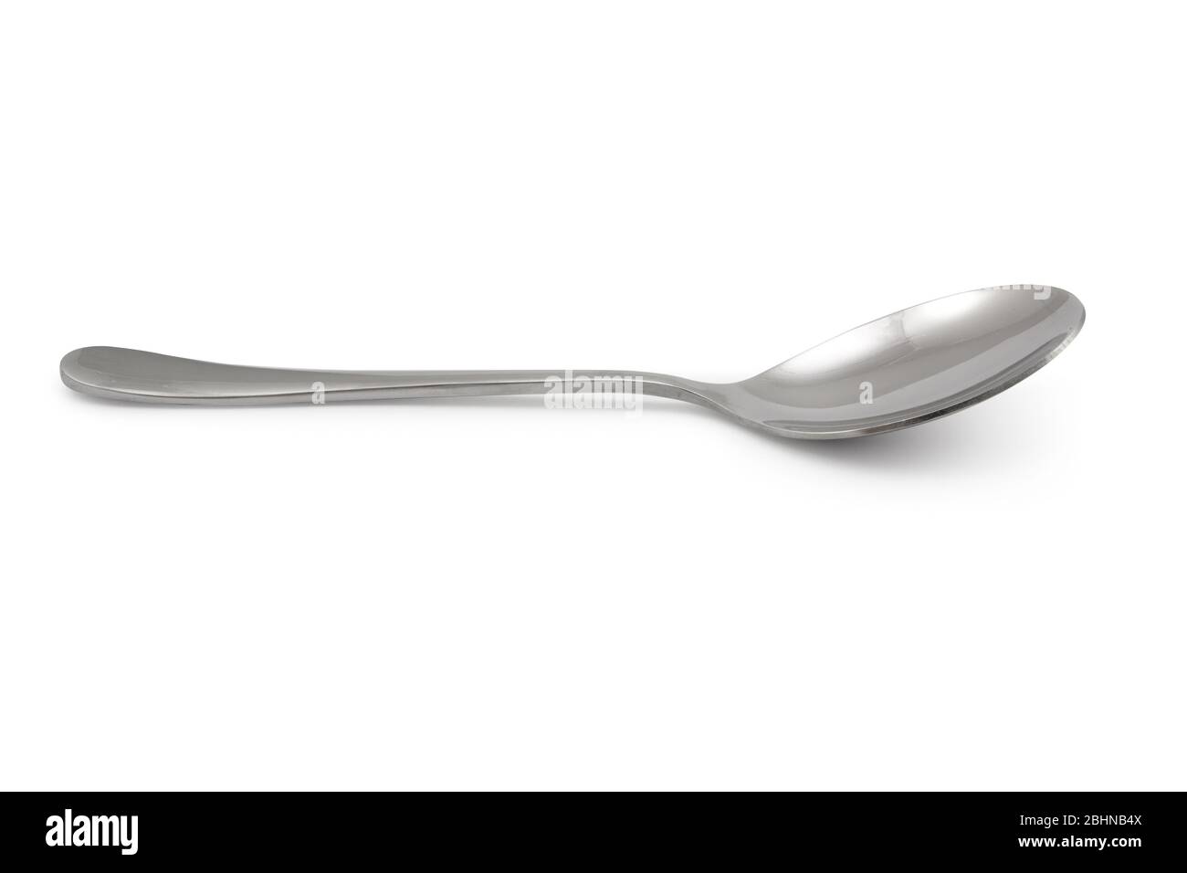 Stainless steel glossy metal kitchen spoon isolated over the white ...