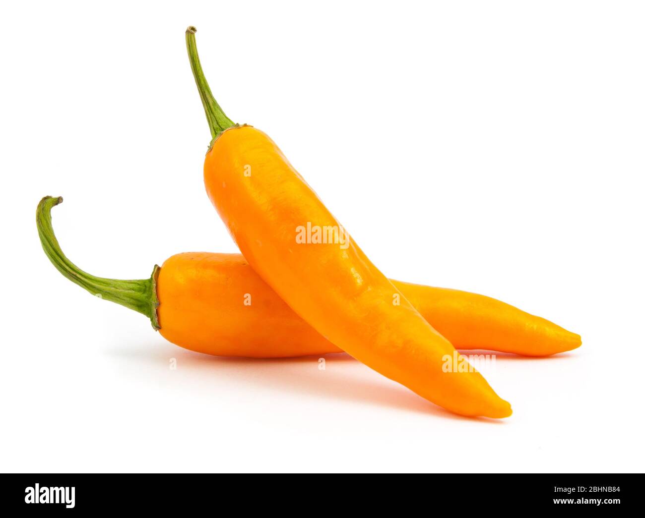 orange hot chili pepper isolated on a white background Stock Photo - Alamy