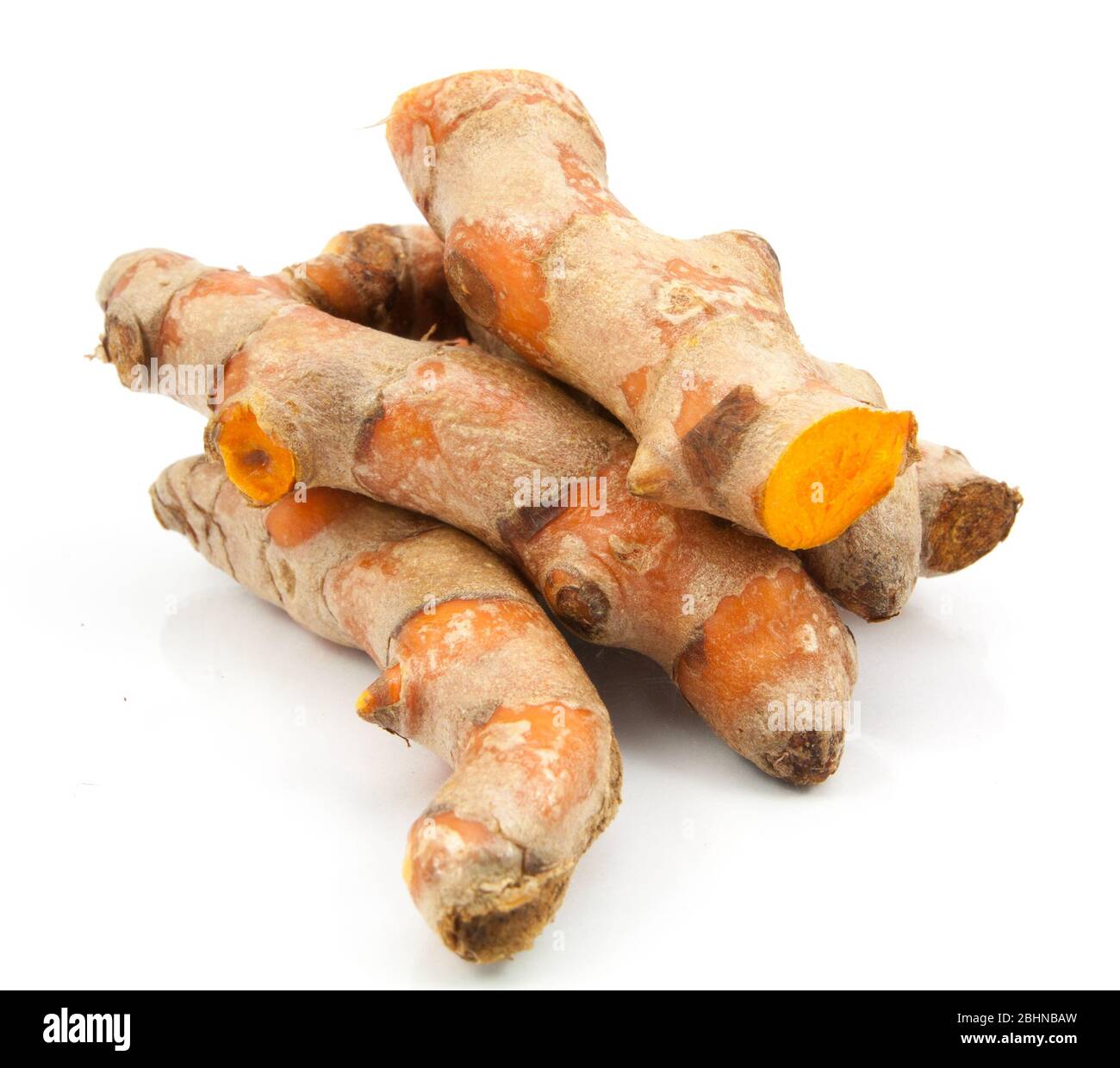 turmeric isolated on white background Stock Photo - Alamy