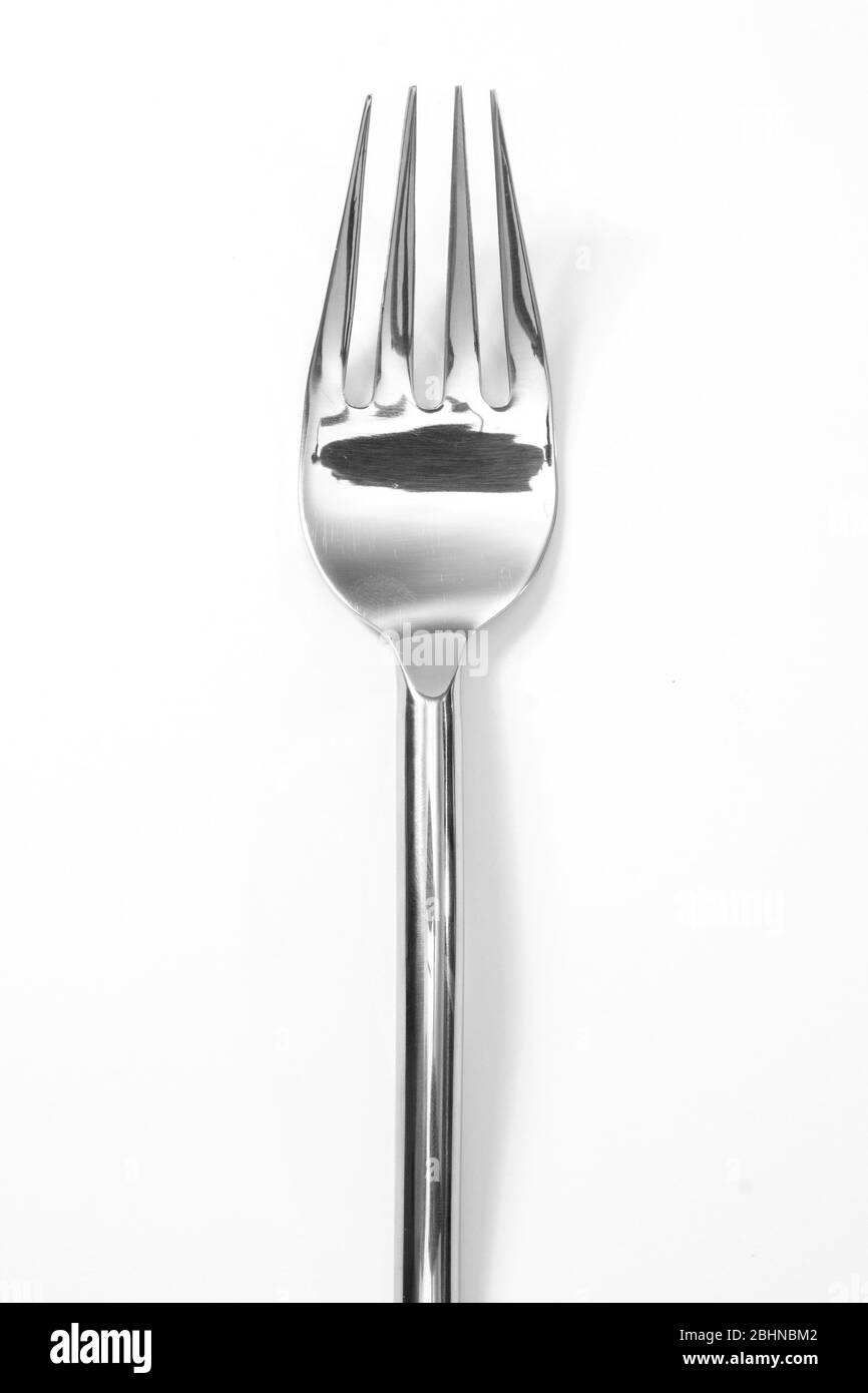 silver fork on white background Stock Photo - Alamy
