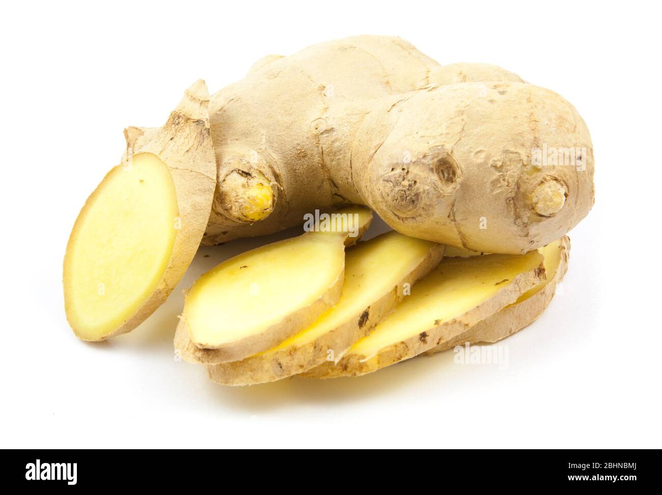 fresh ginger slide on white background Stock Photo - Alamy