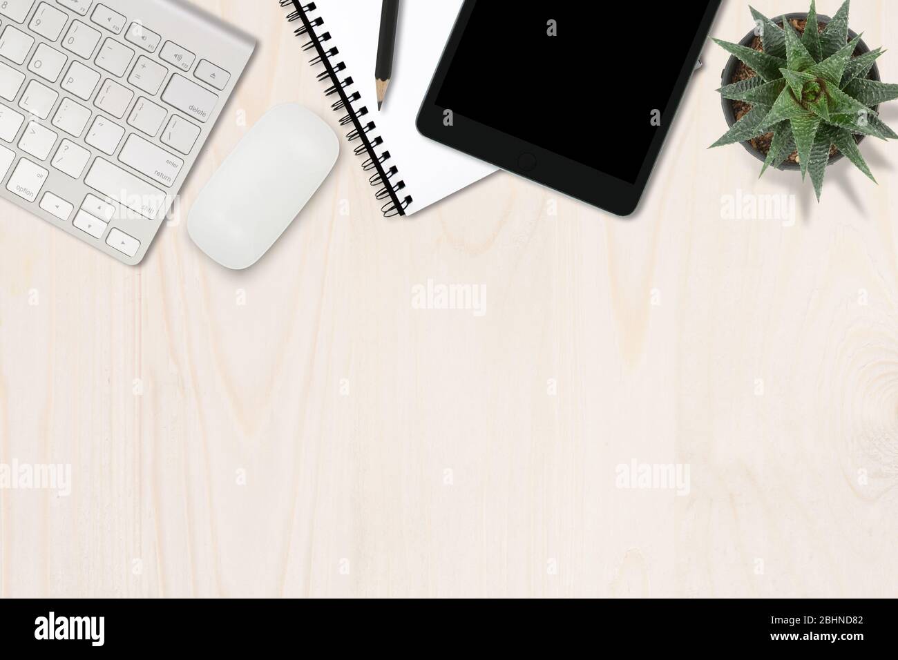 work table with notepad computer from above with copy space Stock Photo ...