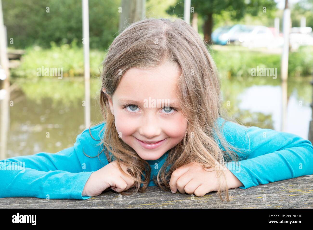 pretty cute child girl outdoor riverside in summer Stock Photo - Alamy