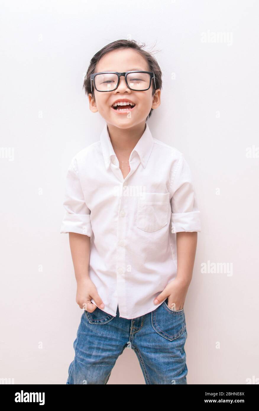 white shirt on little smart asian boy Stock Photo - Alamy