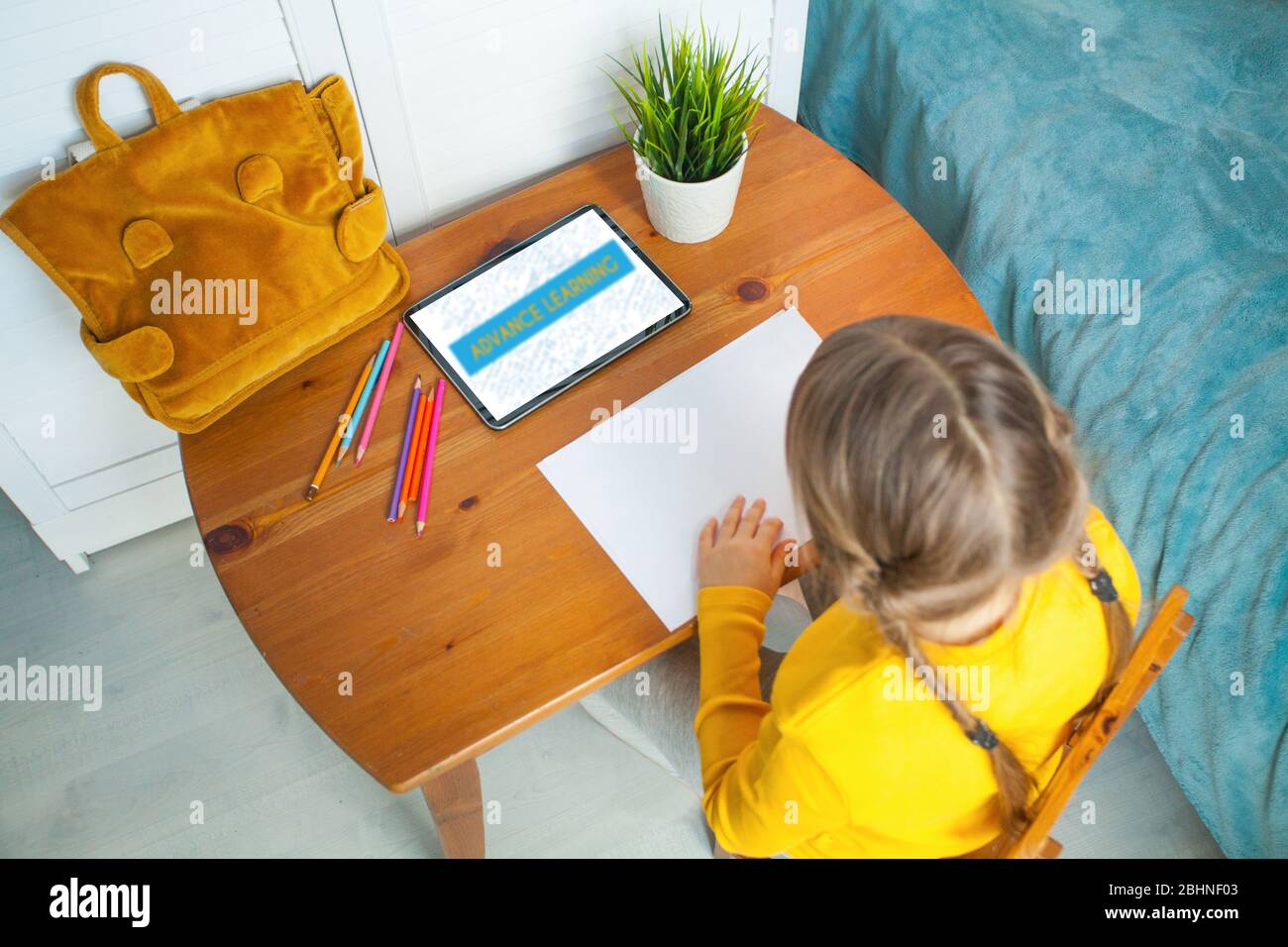 Child girl learning at home Stock Photo - Alamy