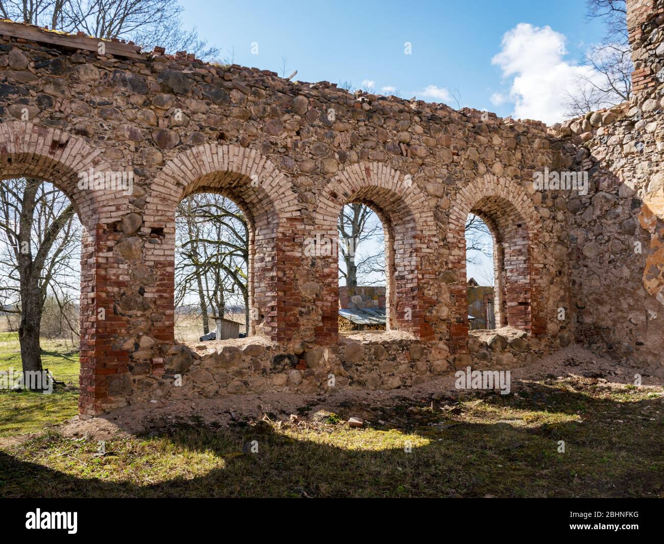 landscape with beautiful abandoned church ruins, arched windows, stone ...