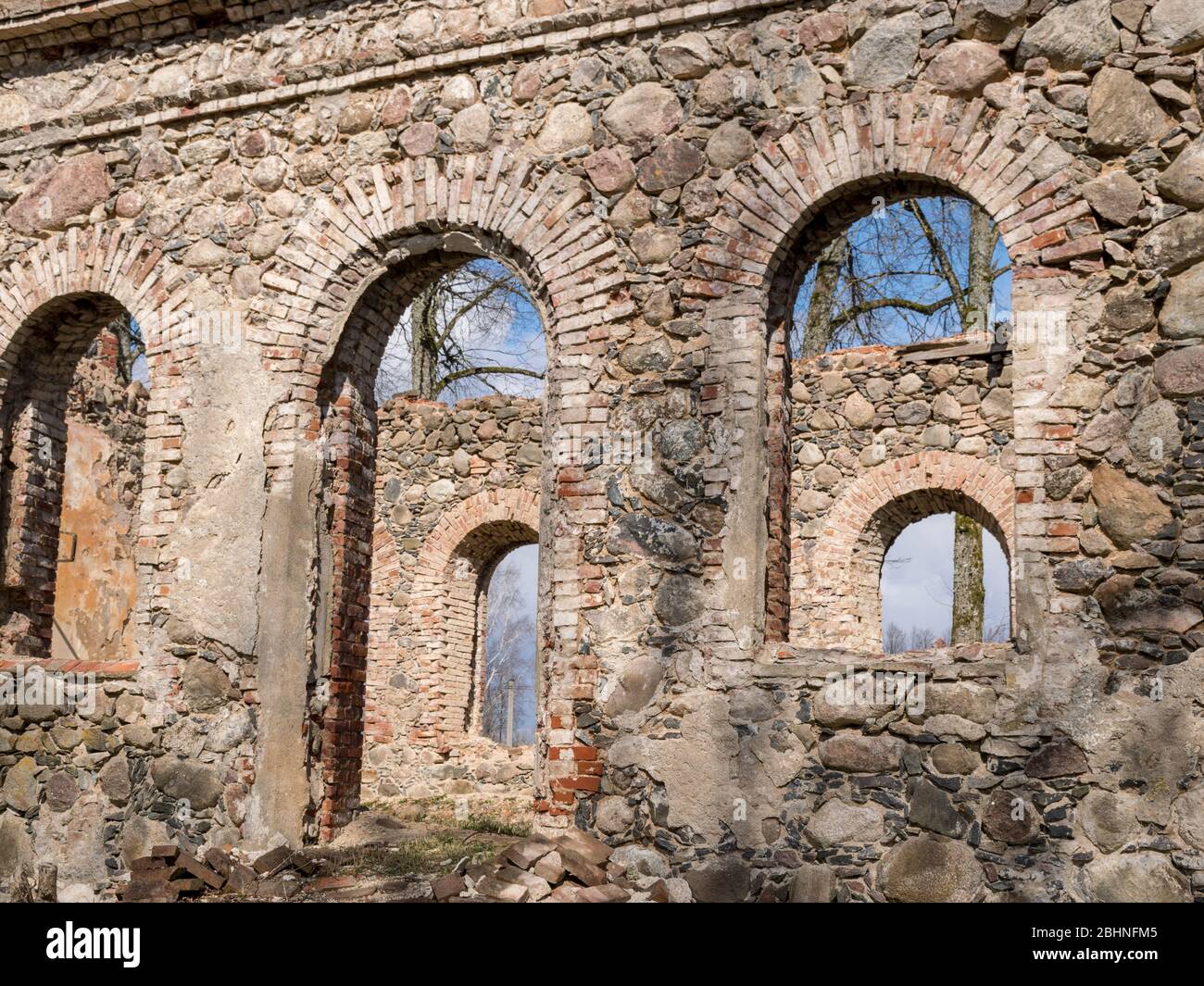 landscape with beautiful abandoned church ruins, arched windows, stone ...
