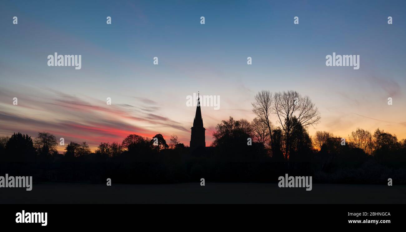 St Marys Church at dawn in Adderbury, Oxfordshire, England. Silhouette ...