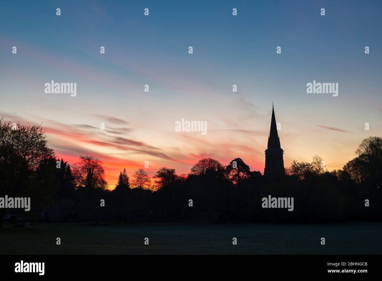 St Marys Church at dawn in Adderbury, Oxfordshire, England. Silhouette ...