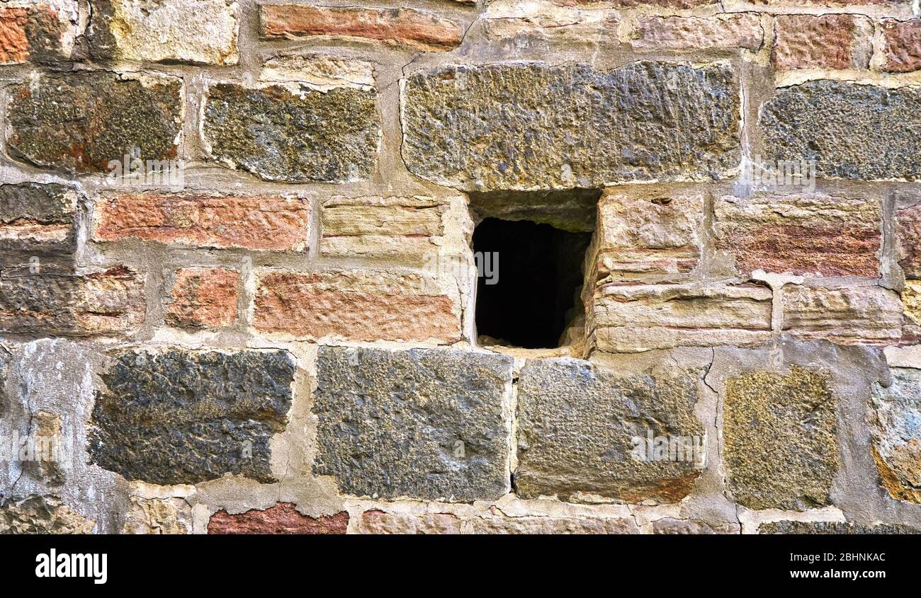 Large hole in the stone wall hi-res stock photography and images - Alamy